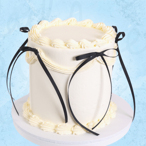 White Vintage Ribbon Cake