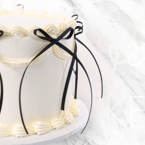 White Vintage Ribbon Cake