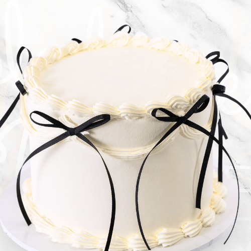 White Vintage Ribbon Cake